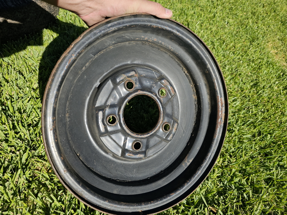 Various wheels from 1940 Ford Deluxe purchase - The Ford Barn